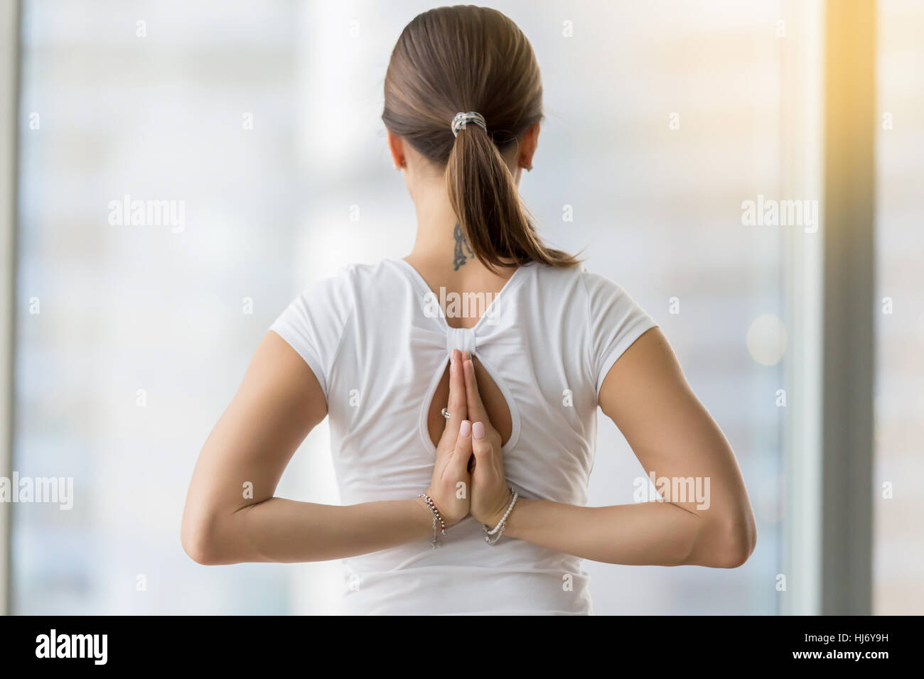 Yoga Posture Hands Behind Back High Resolution Stock Photography and ...