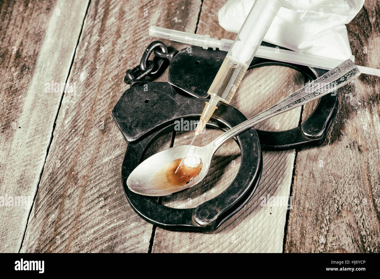 Drug syringe and cooked heroin Stock Photo - Alamy