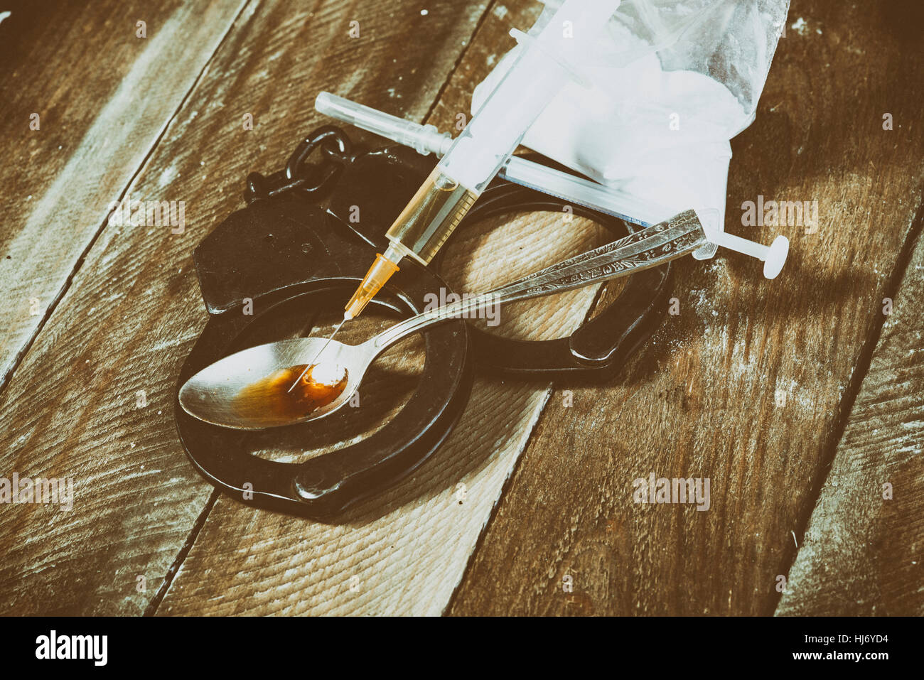 Drug syringe and cooked heroin Stock Photo - Alamy