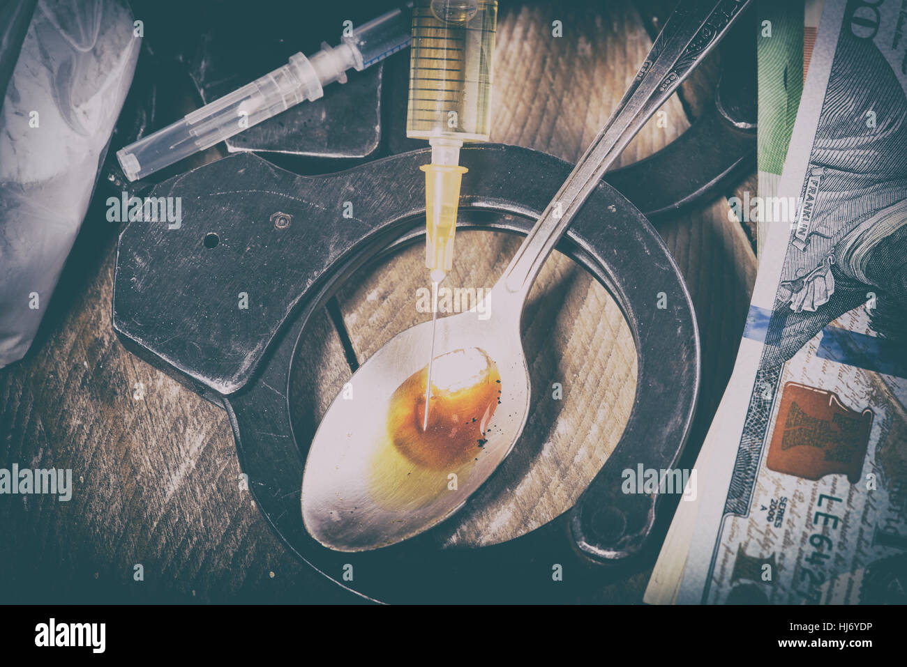 Drug syringe and cooked heroin Stock Photo - Alamy