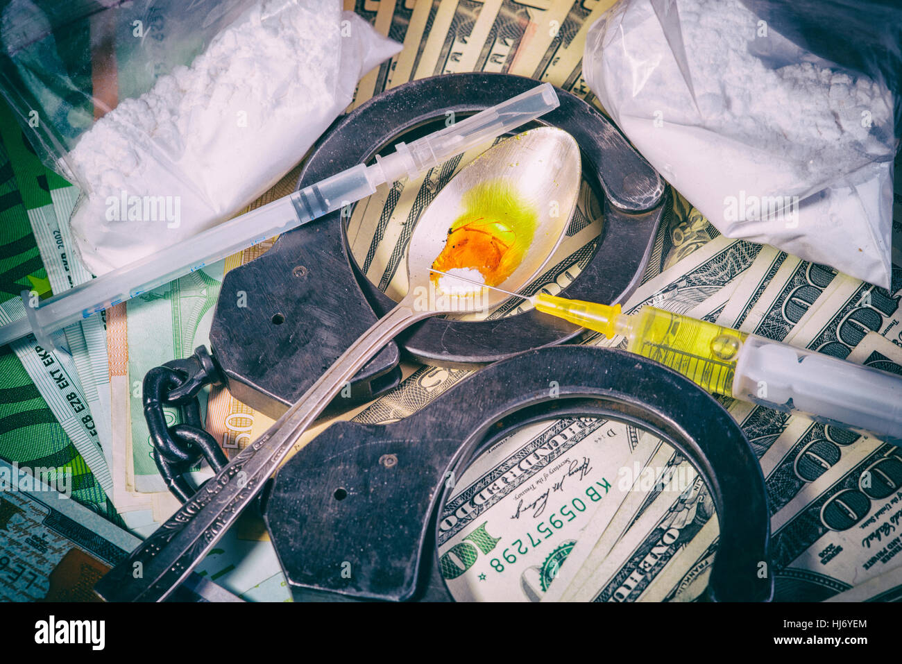 Drug syringe and cooked heroin Stock Photo - Alamy