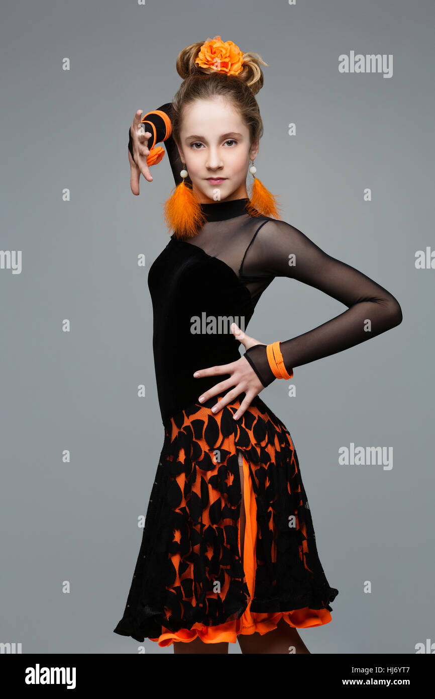 Beautiful ballroom dancer in salsa dress Stock Photo - Alamy