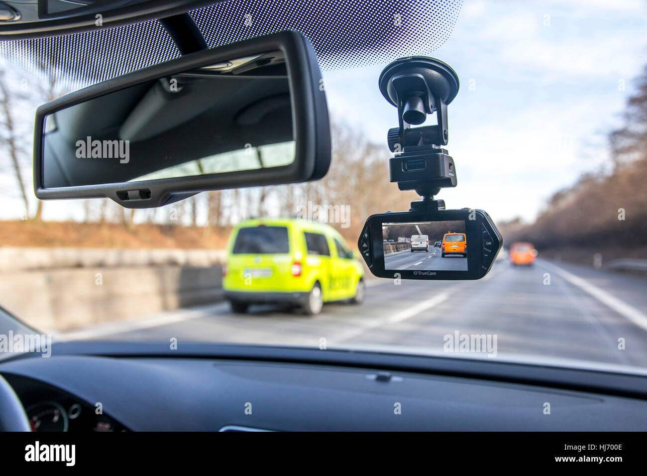 Dashcam in a passenger car, video camera on the windshield, permanently ...