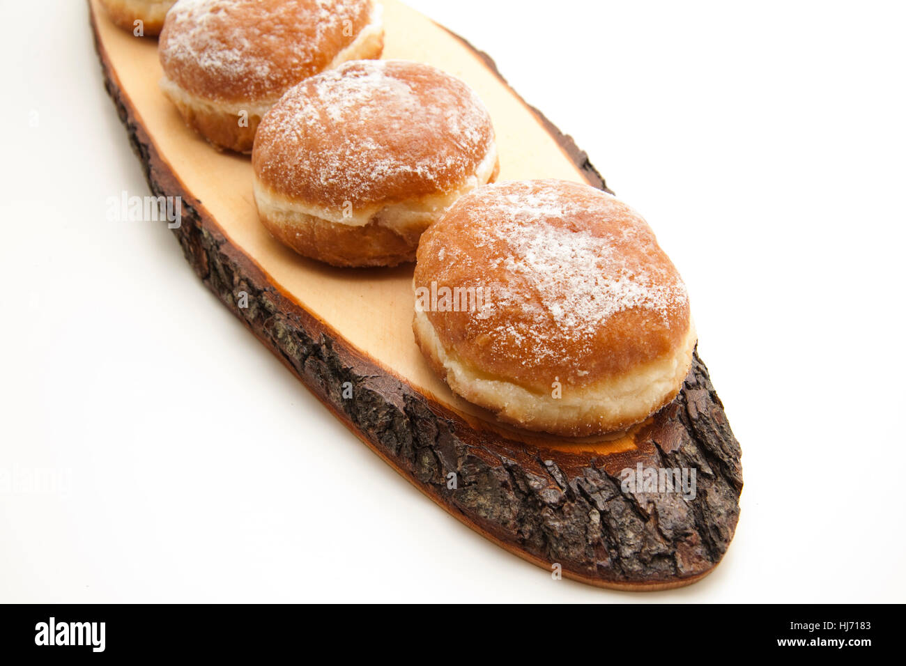 donuts on wooden plate Stock Photo - Alamy