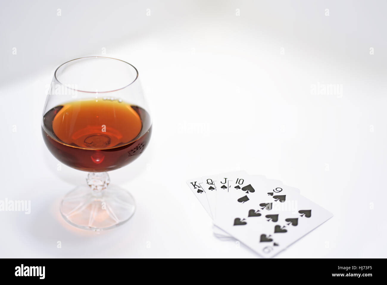 Composition of drinking and playing cards Stock Photo - Alamy