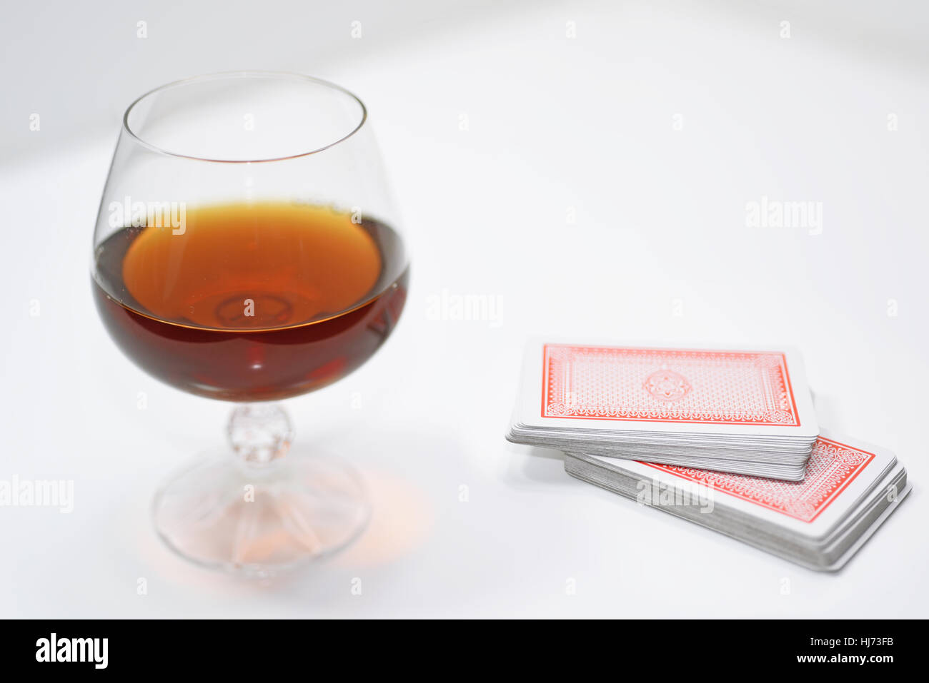 Composition of drinking and playing cards Stock Photo - Alamy