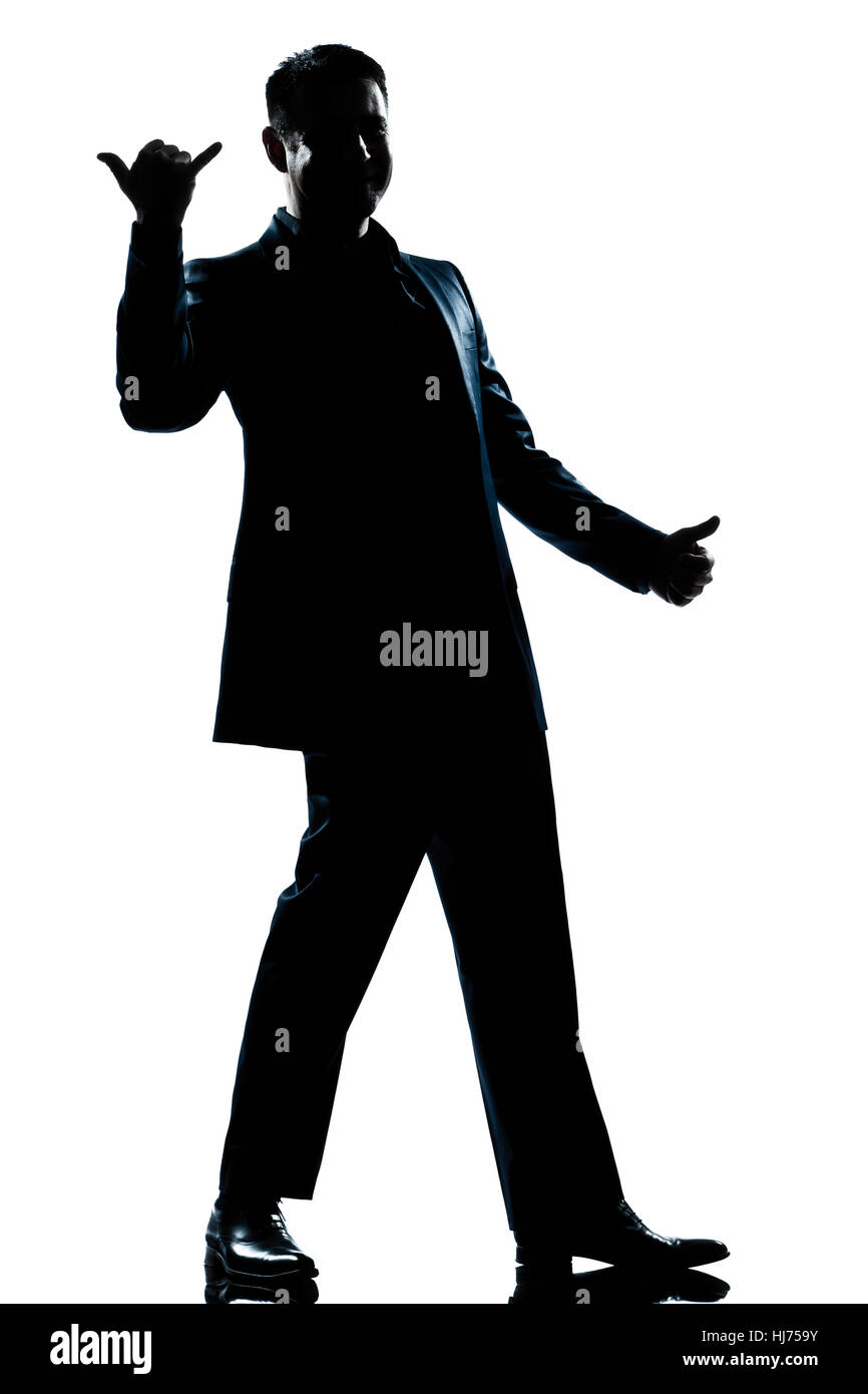 one caucasian man happy saluting shaka sign full length silhouette in ...