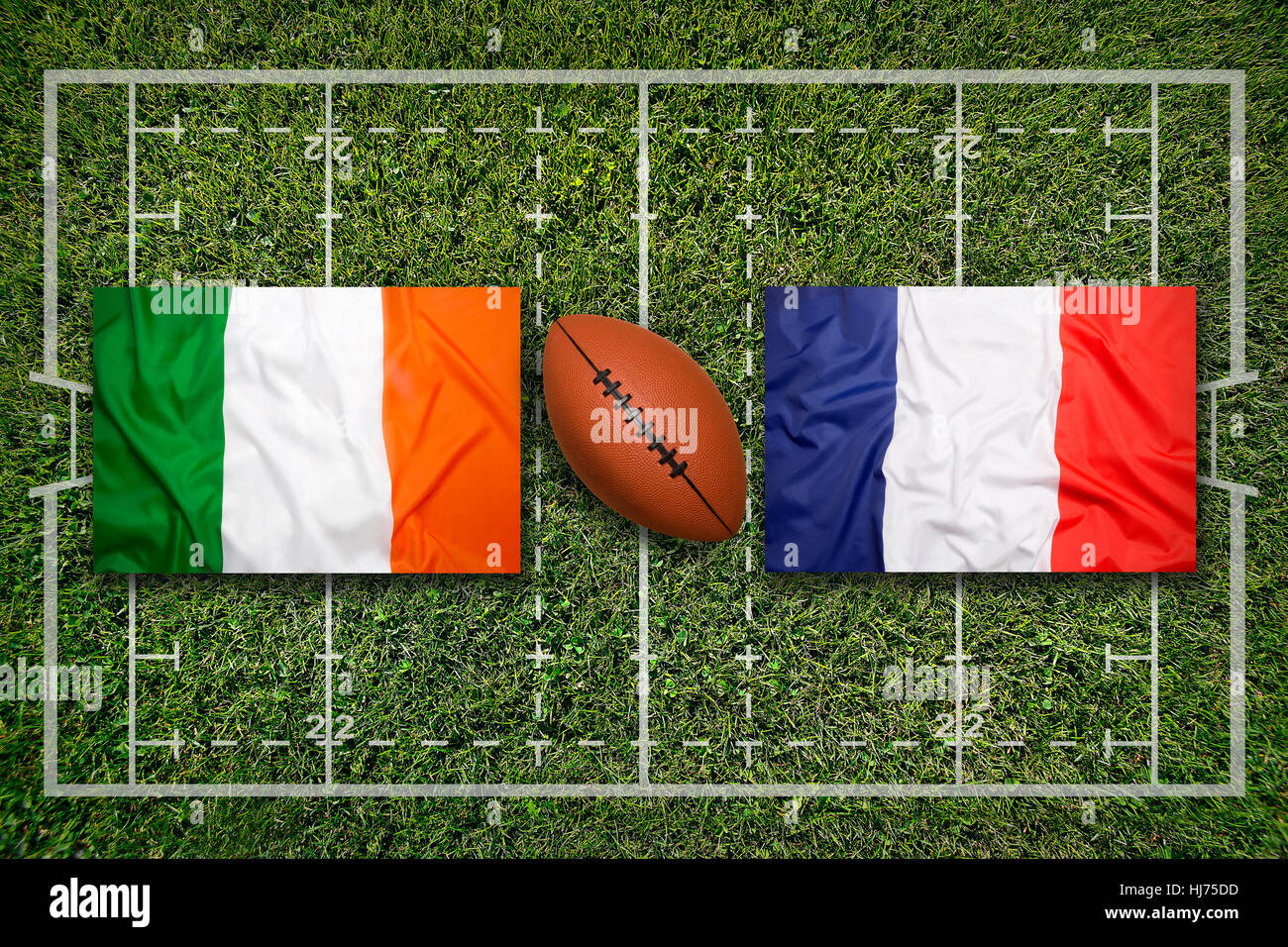 Ireland vs. France flags on green rugby field Stock Photo - Alamy