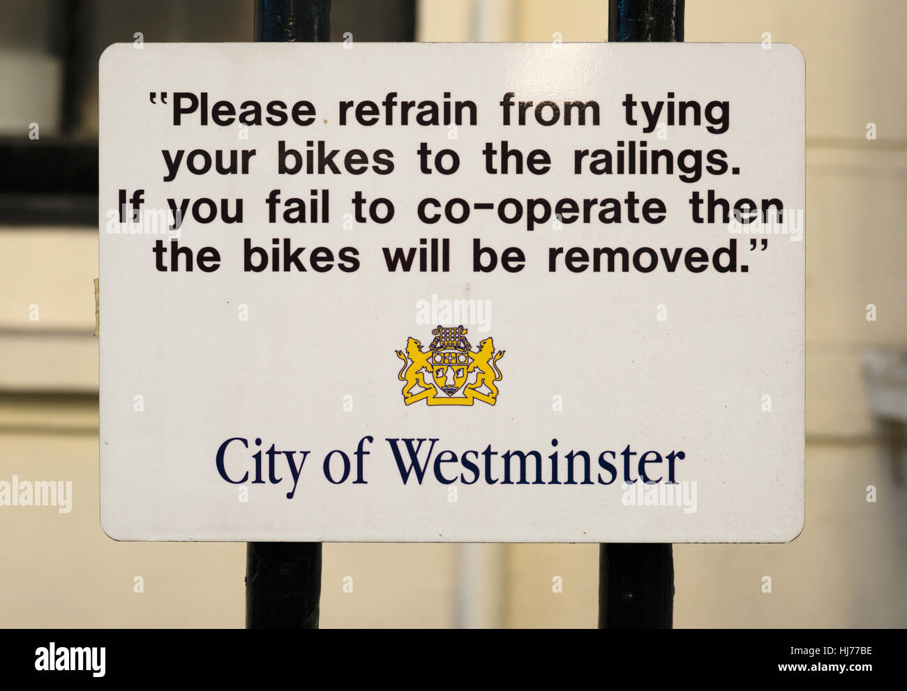 Local council sign warning of removal if bicycles attached to railings ...