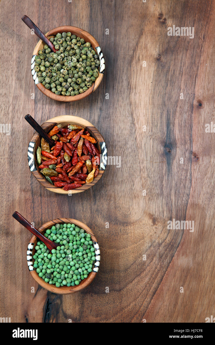 mage of various pepper in the wooden bowls Stock Photo - Alamy