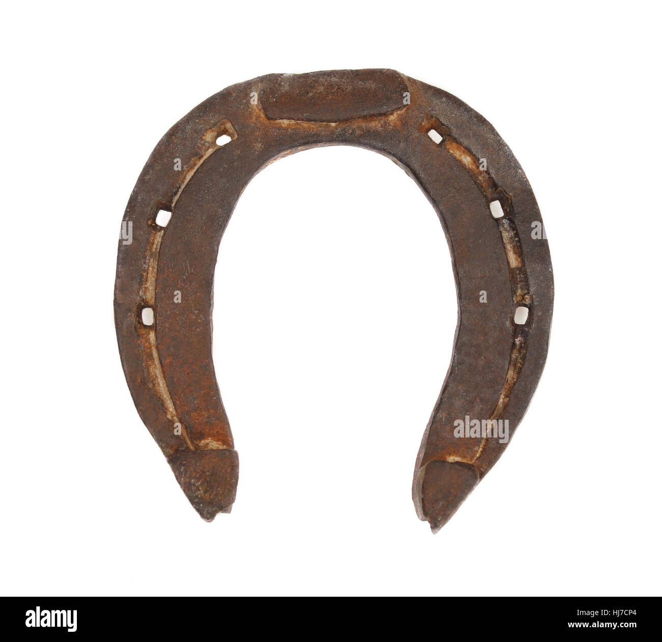 Vintage horshoe isolated on white Stock Photo - Alamy