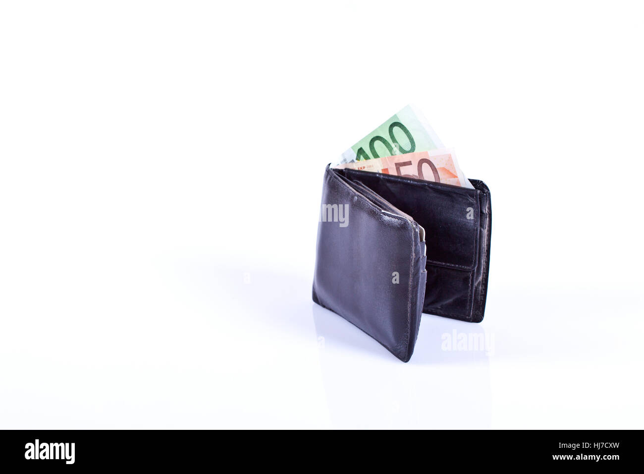 wallet with lots of money Stock Photo - Alamy