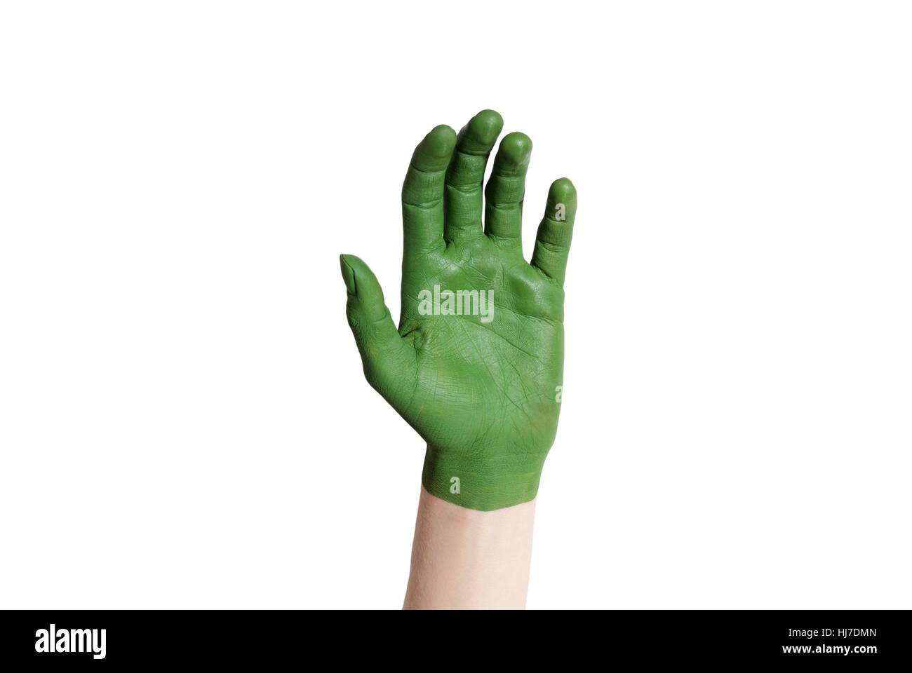 a green painted hand in sickish gesture Stock Photo - Alamy