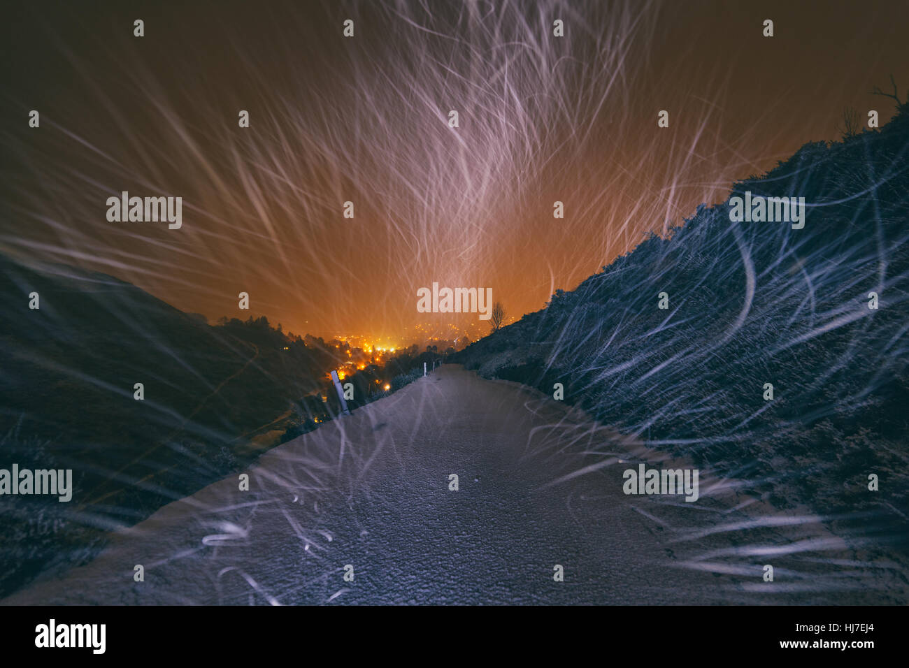 Long Exposure of Snowfall over British Countryside at Night Stock Photo ...