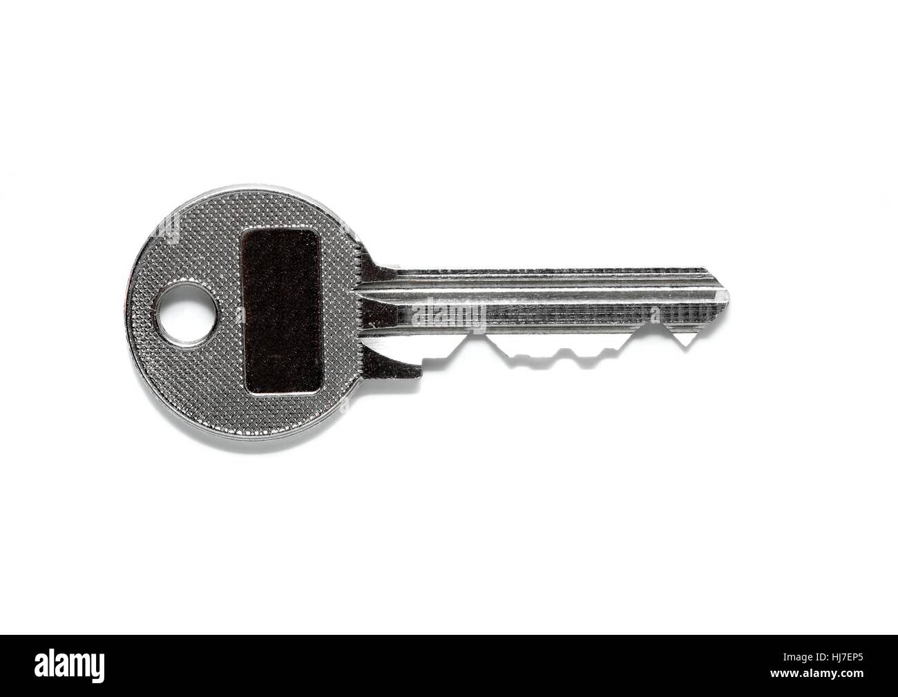 Shiny key isolated on white background Stock Photo - Alamy