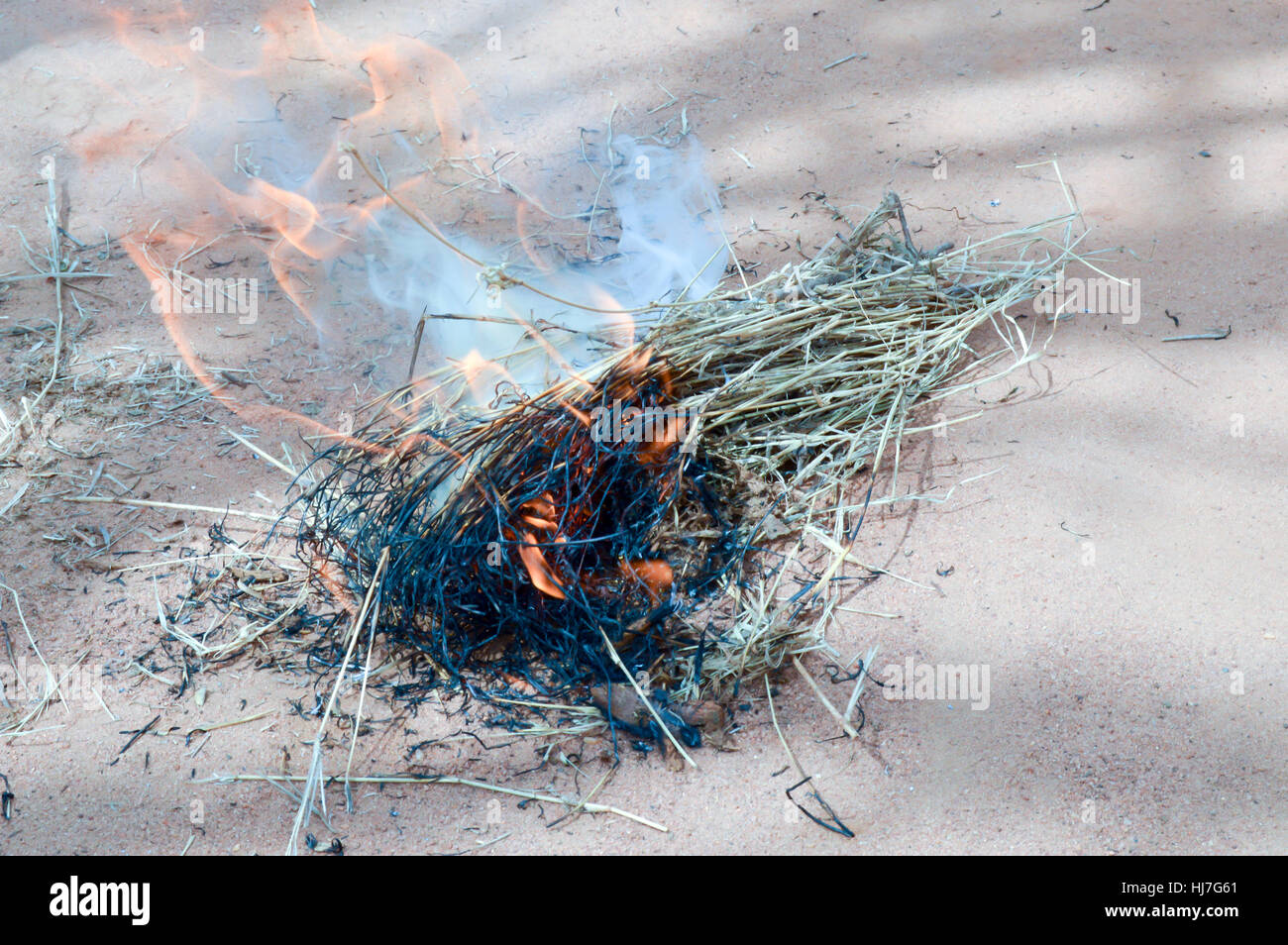 Fire of twigs in a village of Maasai in Kenya Stock Photo - Alamy