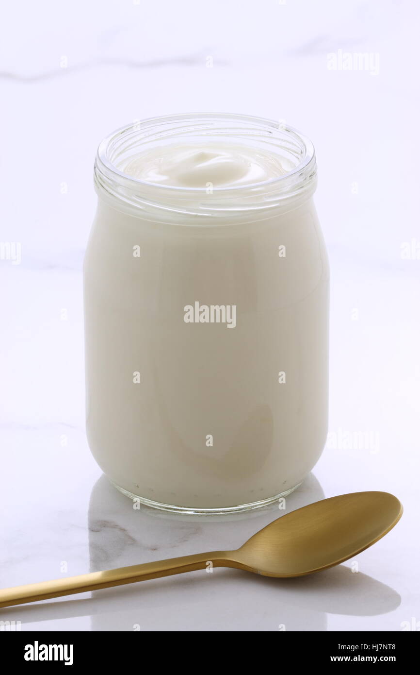 Delicious, nutritious and healthy fresh plain yogurt on vintage italian ...