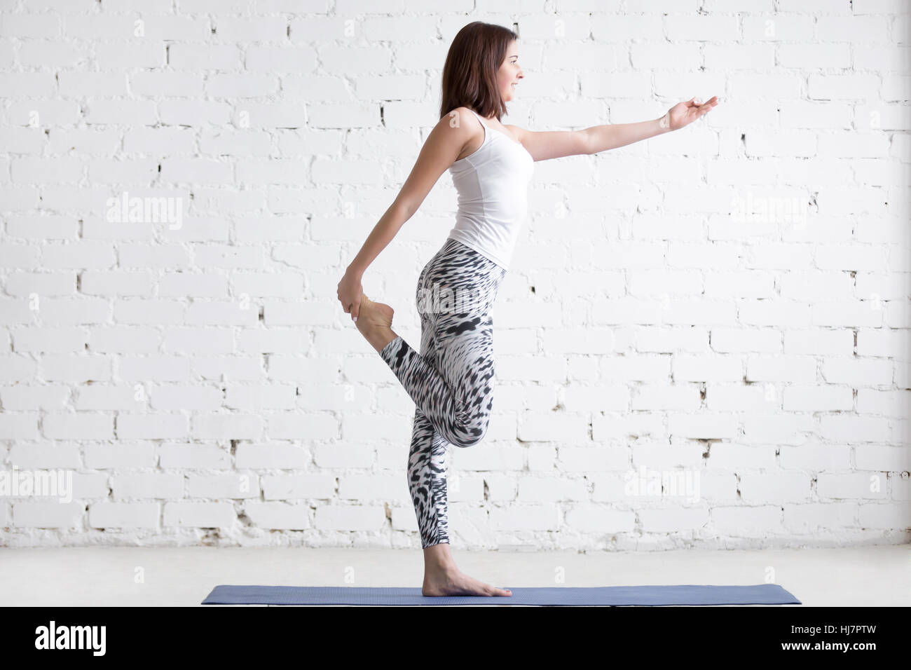 Fitness woman stretching before workout Stock Photo - Alamy