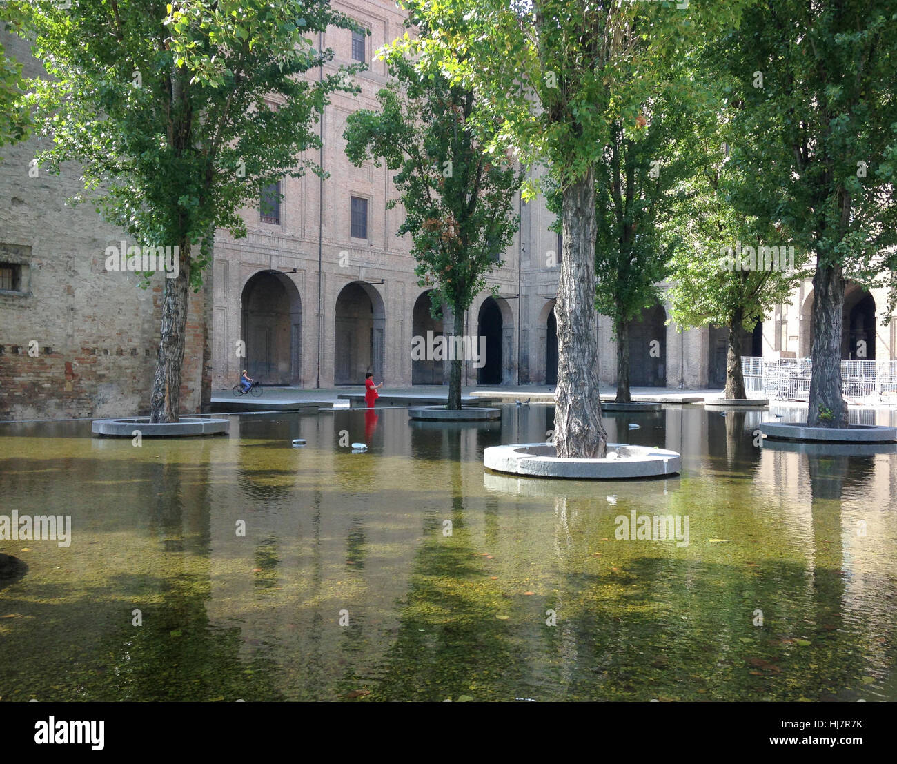 Water and trees landscape in front of Palazzo della Pilotta in Parma ...