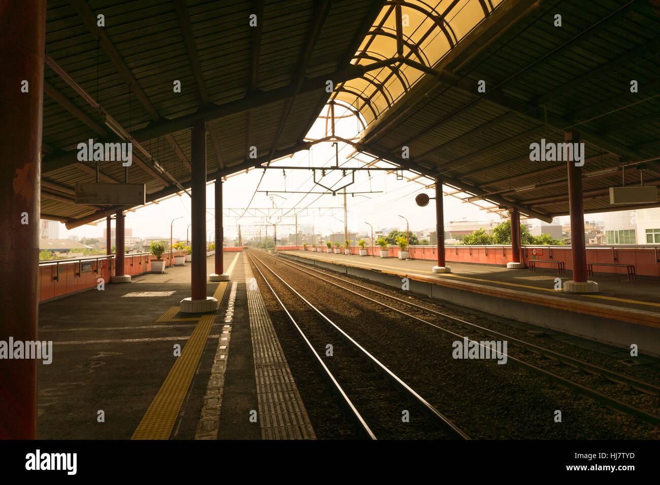 Empty station with many platforms and a sun light photo taken in ...