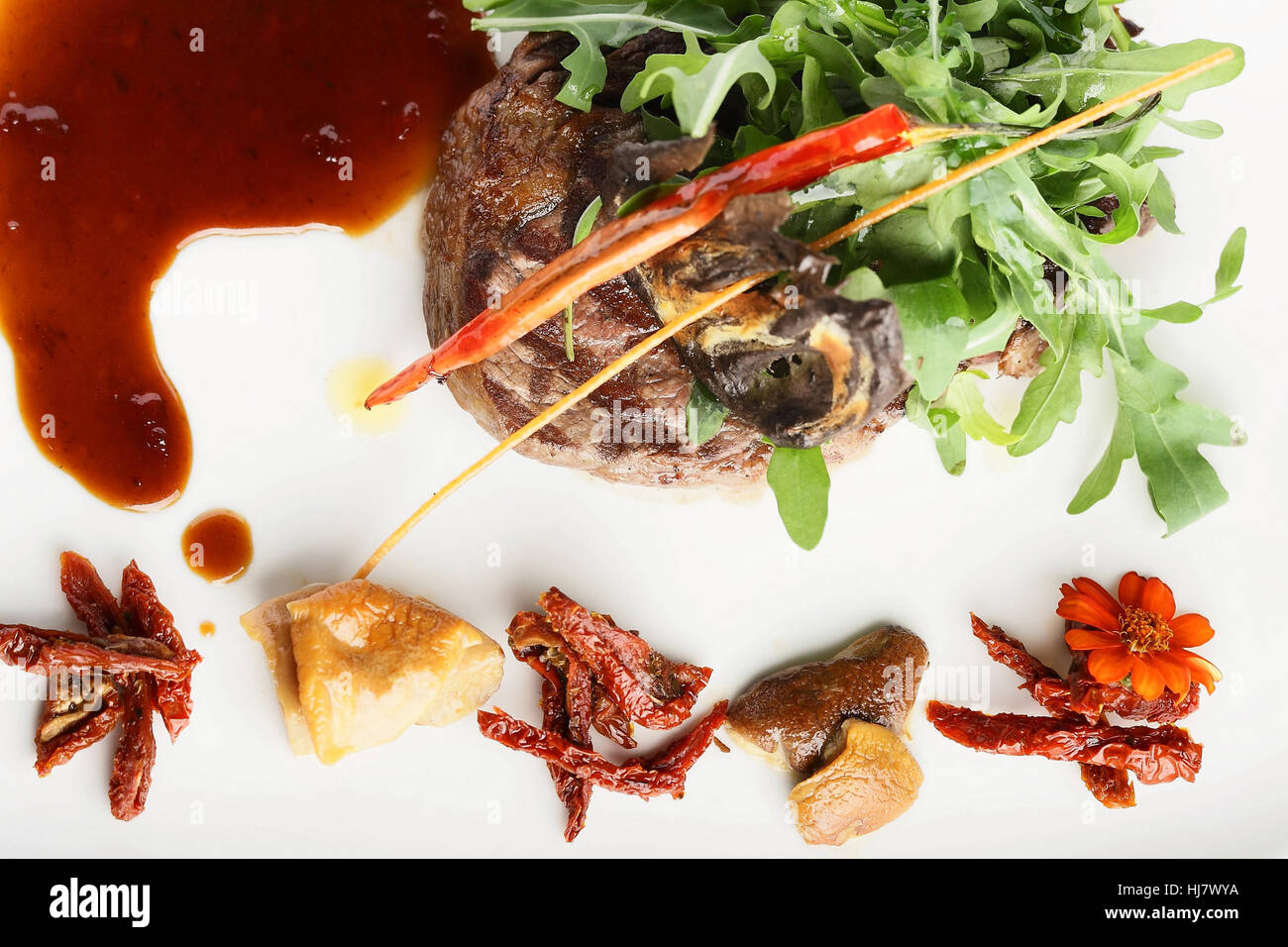 fresh and tasty peaces of meat with garnish Stock Photo - Alamy