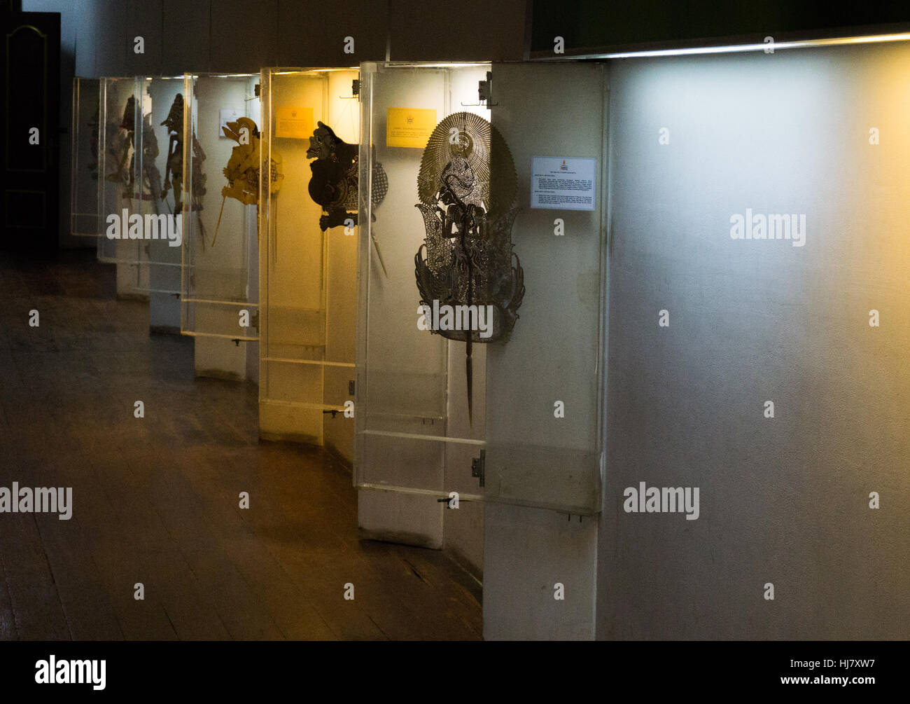 Characters of traditional puppet Wayang displayed on a wall photo taken ...