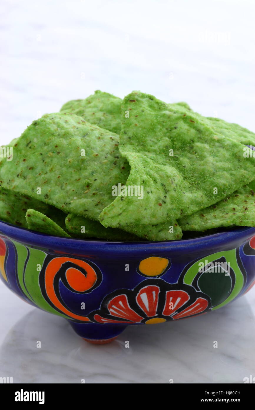 Mexican corn totopos or nacho chips on retro vintage carrara marble ...