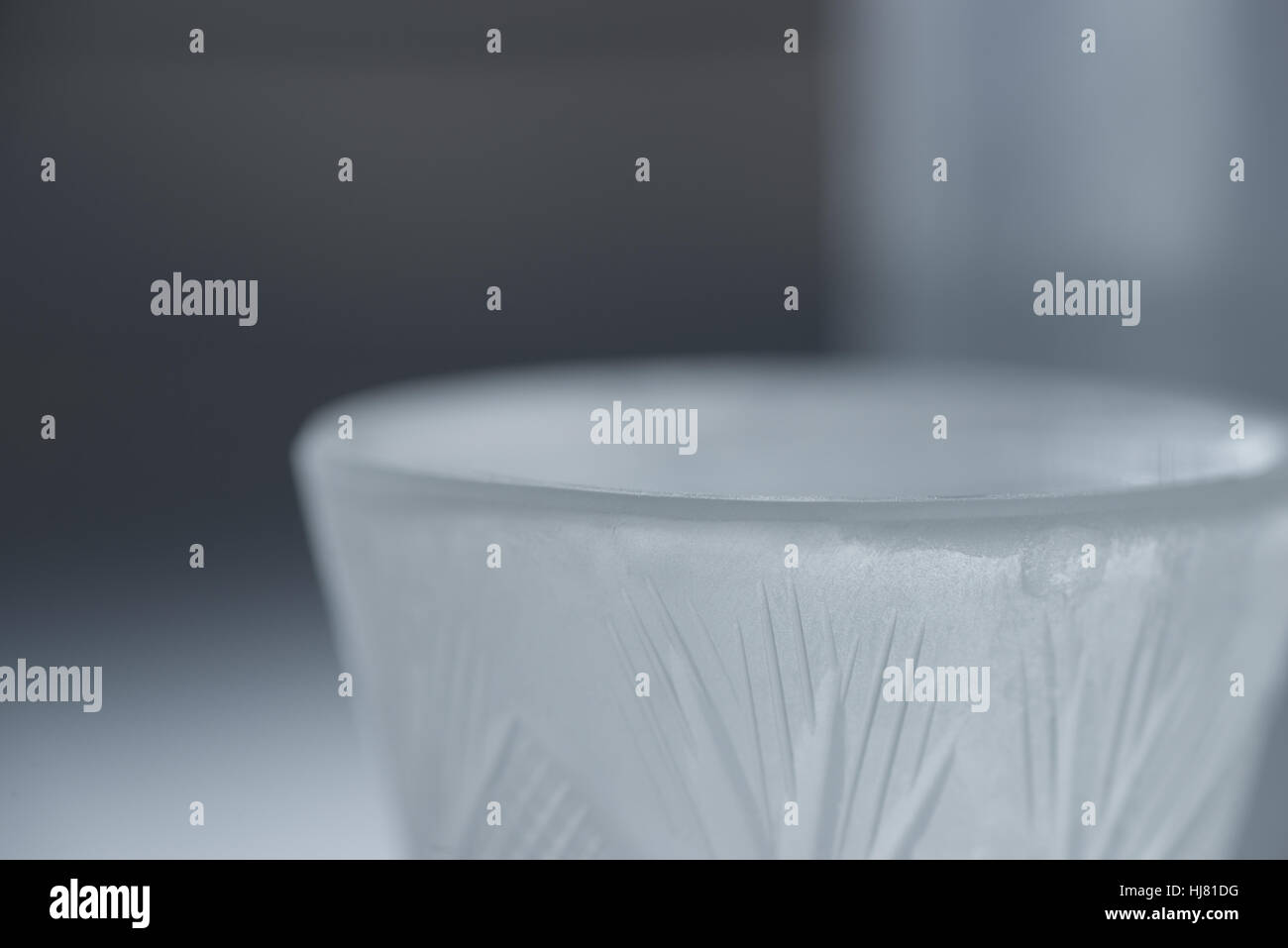 glass of vodka on table Stock Photo - Alamy