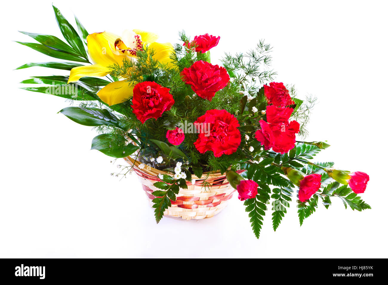 Bright flower bouquet in basket isolated over white background Stock ...