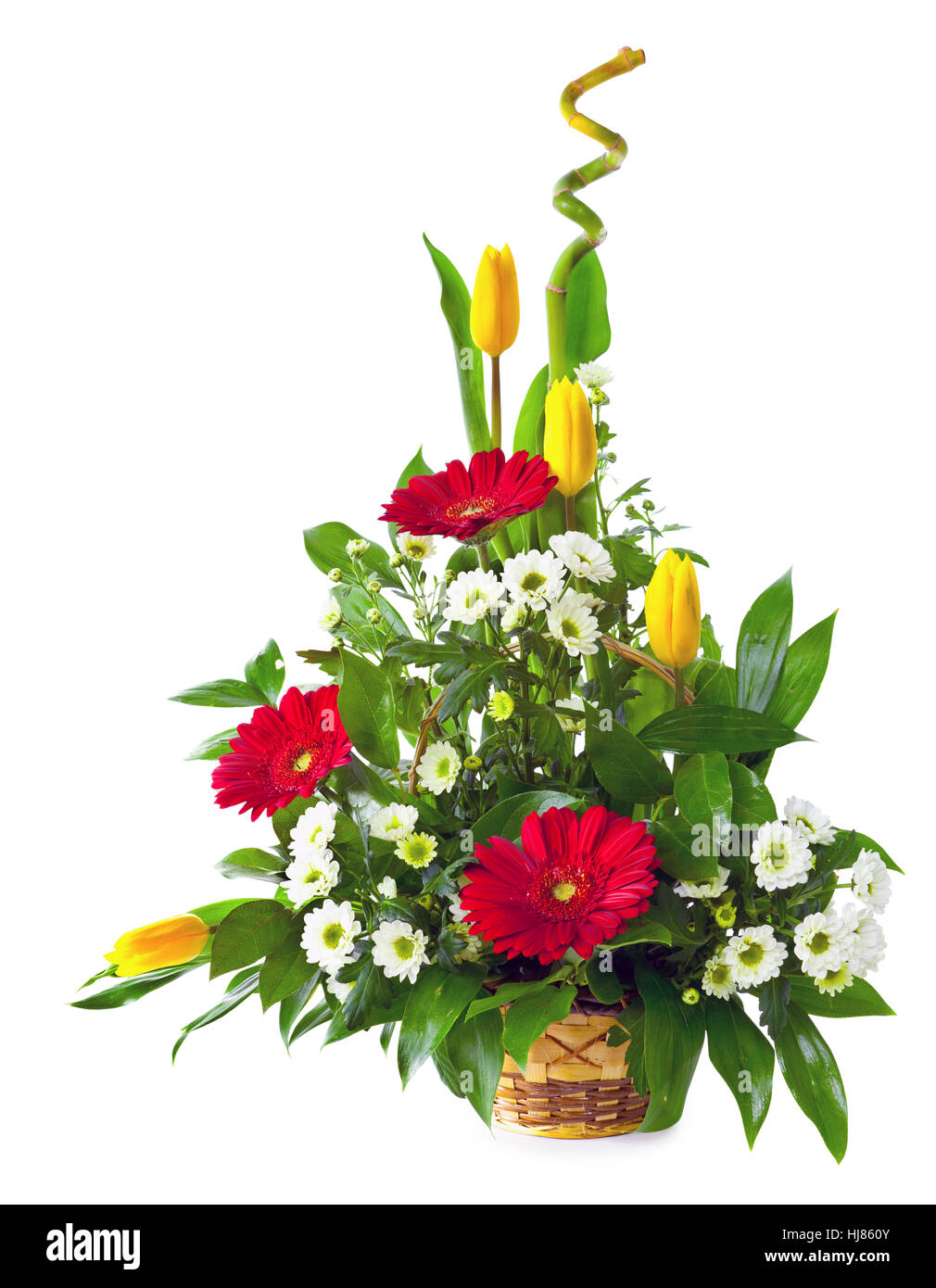 Bright flower bouquet in basket isolated over white background Stock ...