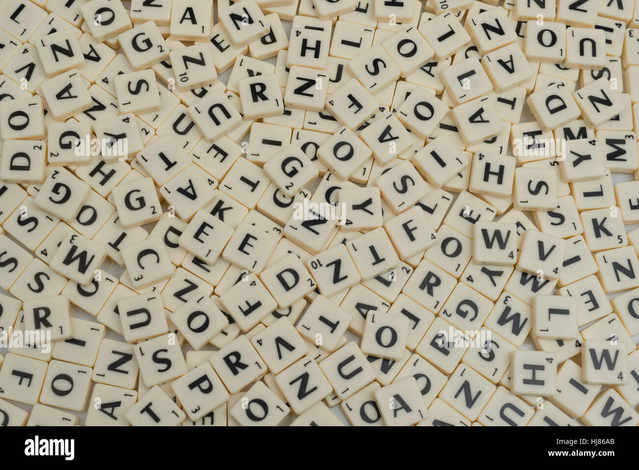 Scrabble-type plastic tiles - illustrating concepts of literacy ...