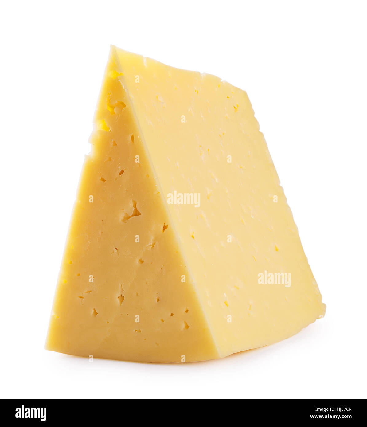 Triangular piece of cheese shot at an angle isolated on white ...