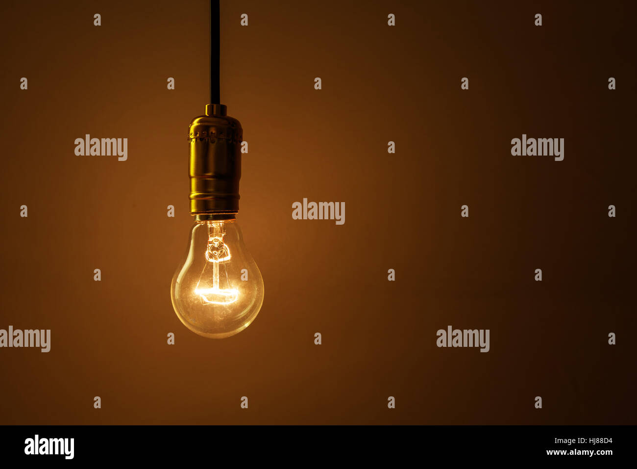 light bulb on dark background Stock Photo - Alamy