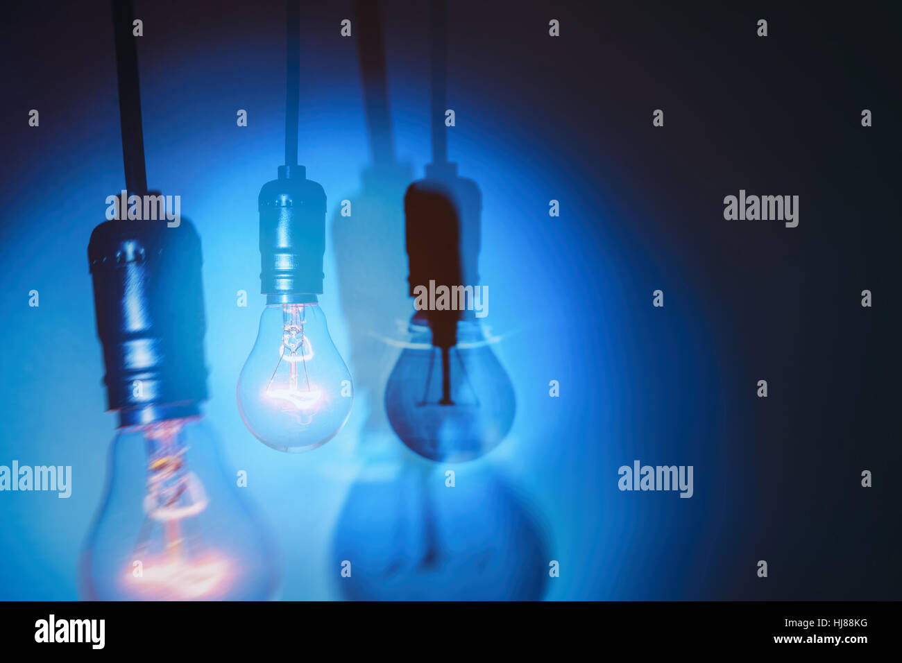 Light bulb with blue background hi-res stock photography and images - Alamy