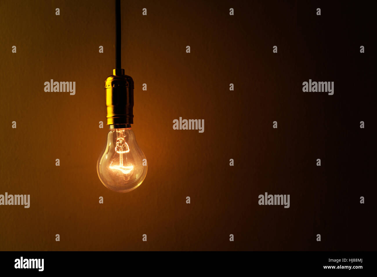 light bulb on brown background Stock Photo - Alamy