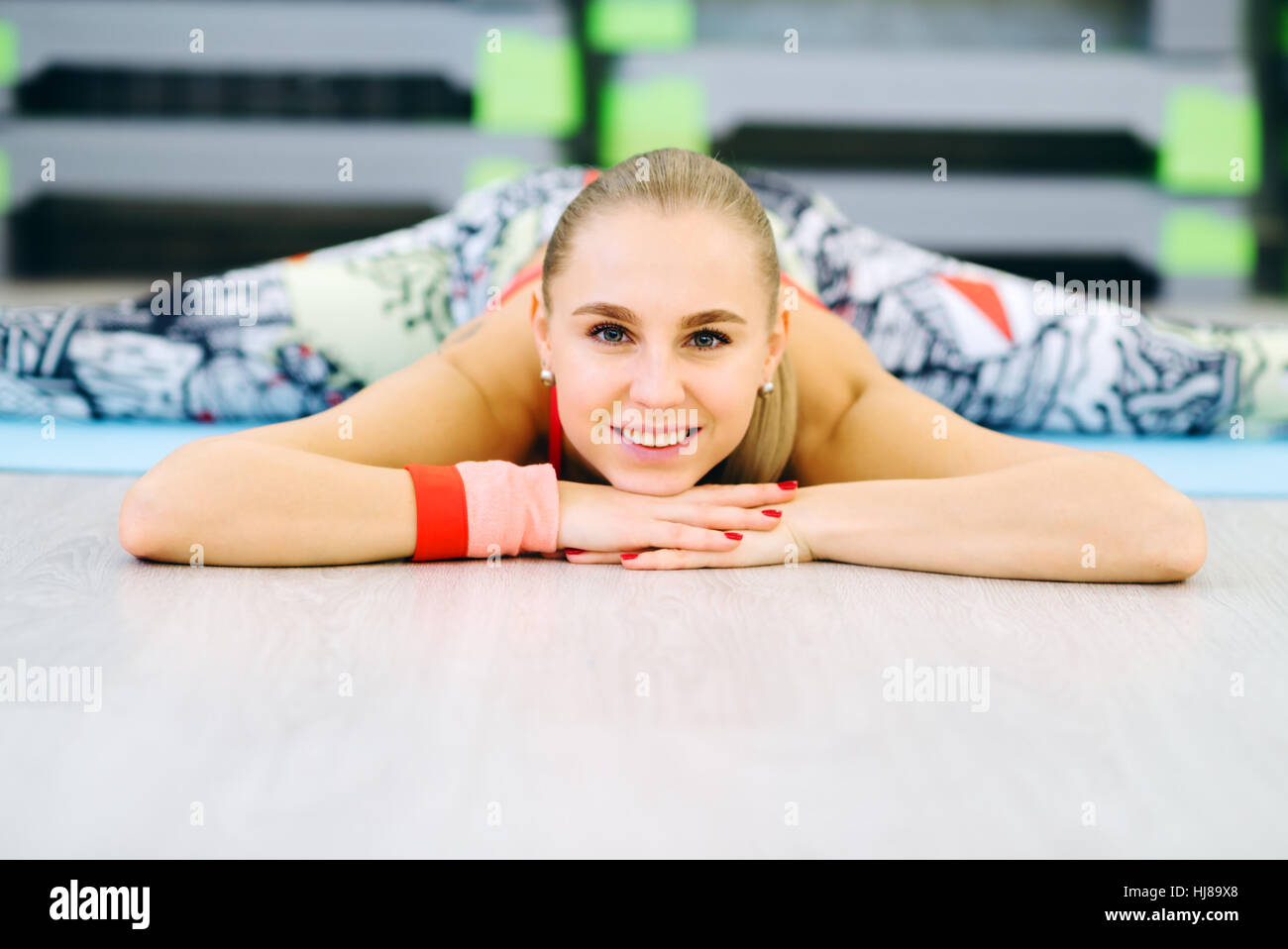 Fitness girl stretching yoga gym Stock Photo - Alamy