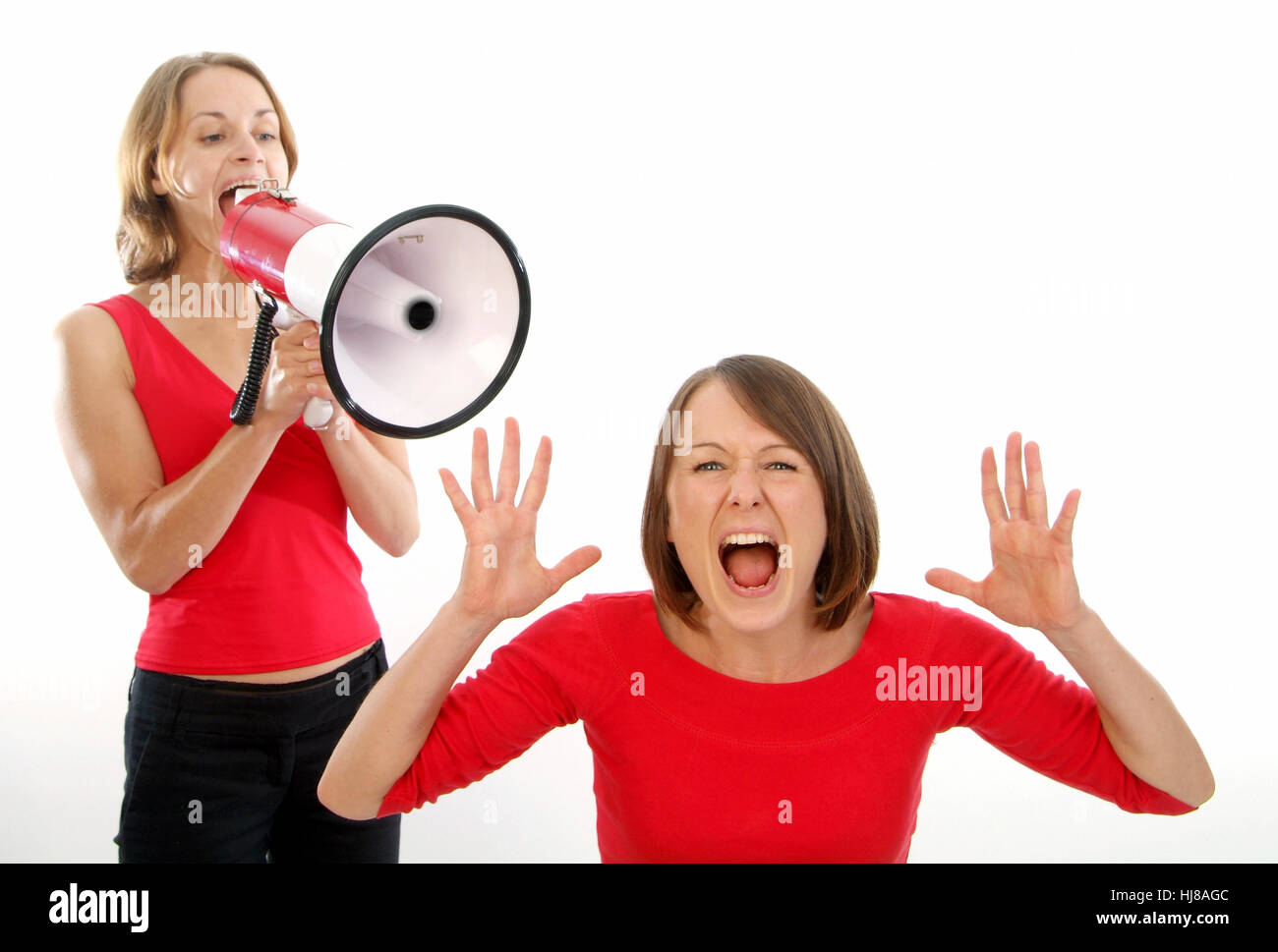 Screaming women with megaphone Stock Photo - Alamy