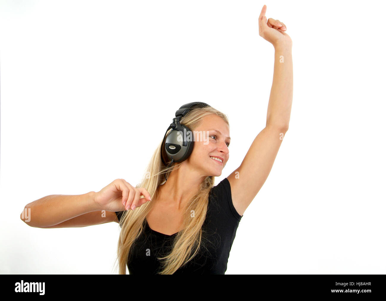 Young woman in motion to music Stock Photo - Alamy