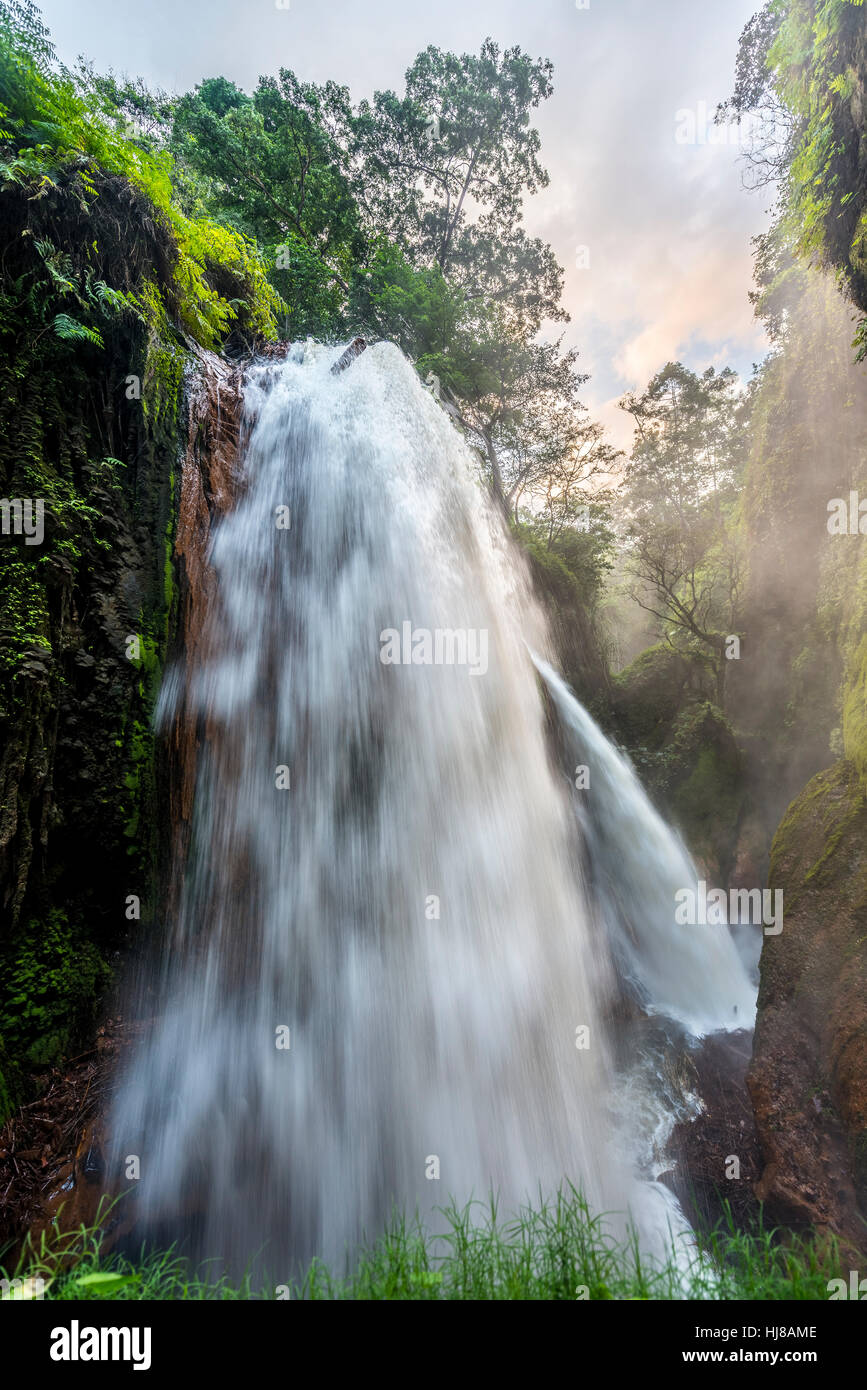 Waterfall in ravine, Air Terjun Belawan, Kalianyar, Sempol, Eastern ...