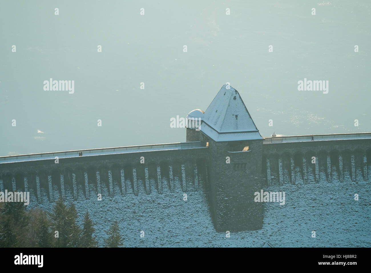 Dam Möhnesee lake in the evening light, winter weather, low water at ...