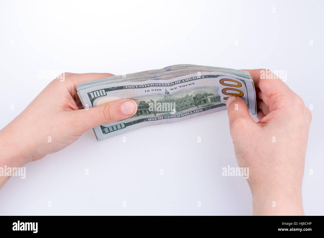 Human hand holding American dollar bill as money isolated on white ...