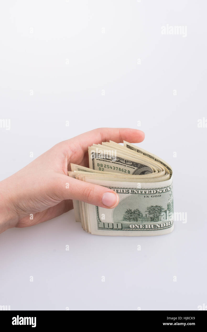 Human hand holding American dollar bill as money isolated on white ...