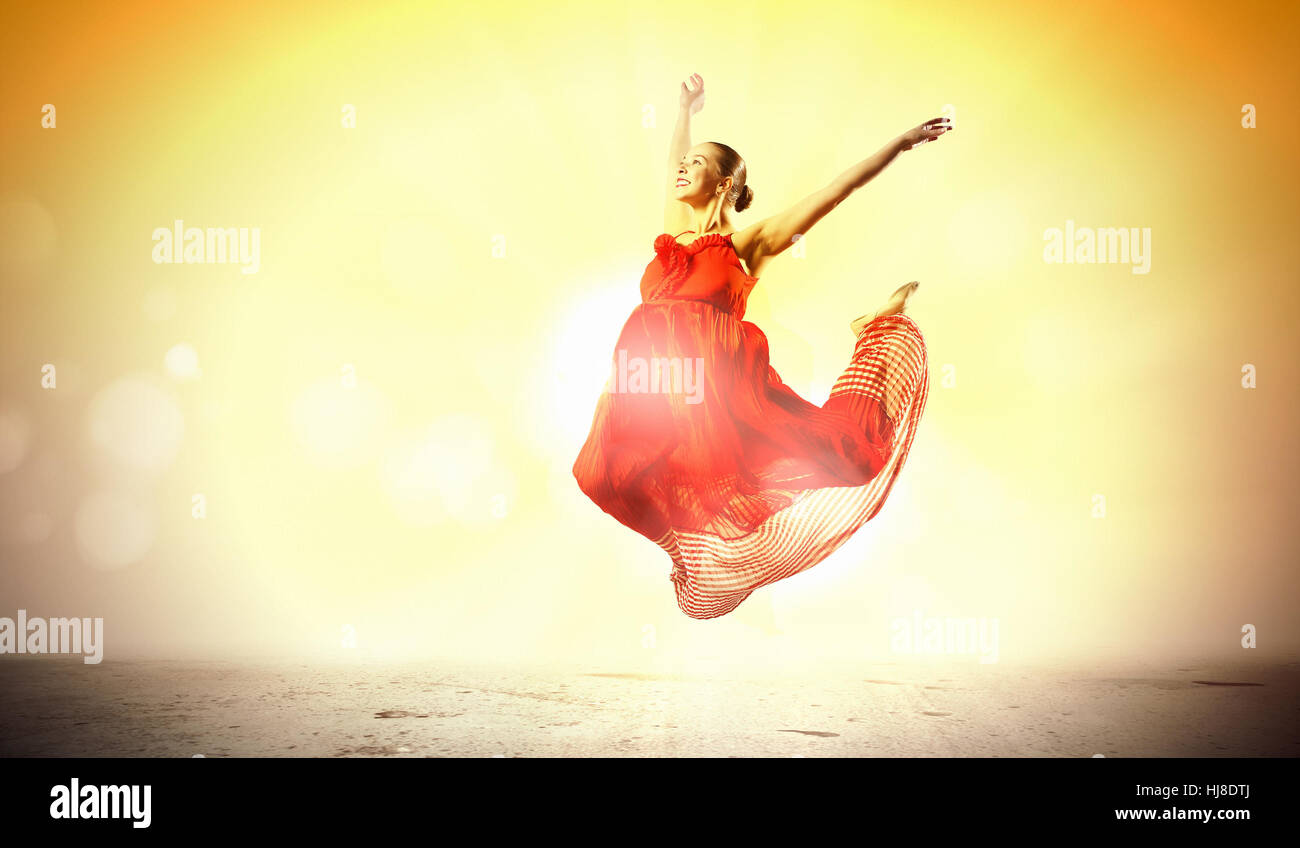 Image of female ballet dancing on coast against sunset background hi ...