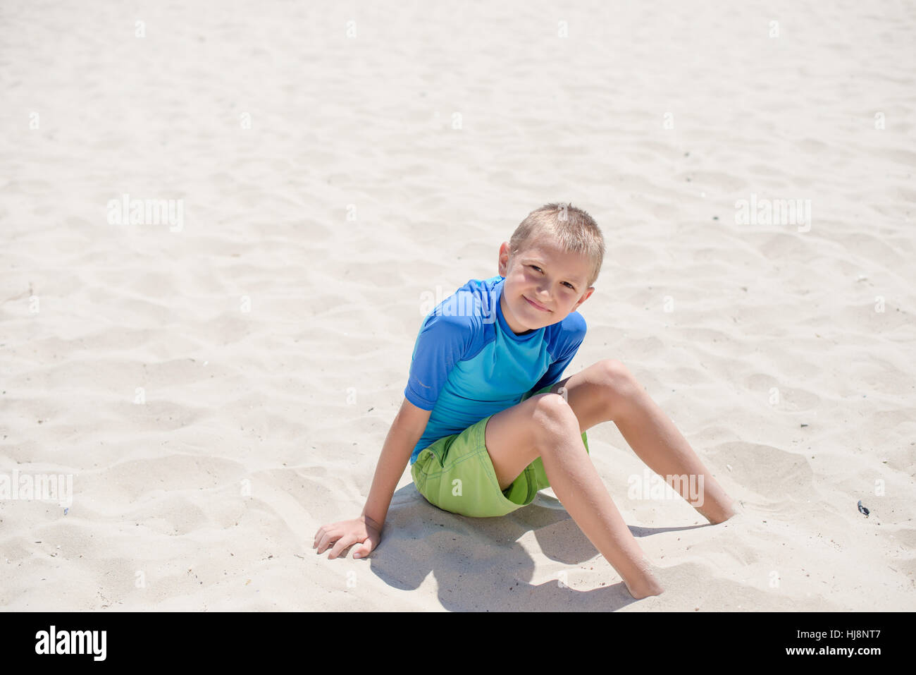 Sitting at the beach hi-res stock photography and images - Alamy