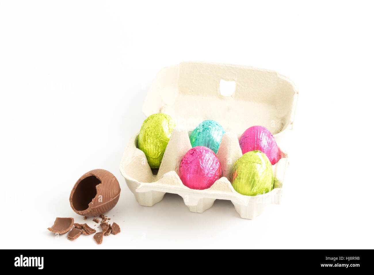 One easter egg on white colourful foil hi-res stock photography and ...