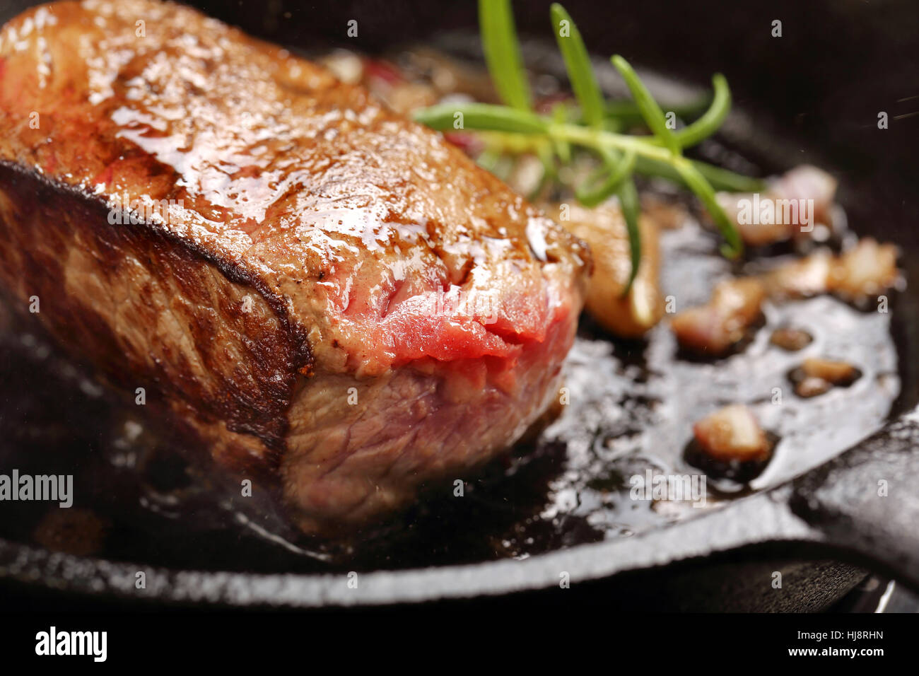 Beef steak on cast iron skillet with empty space for text Stock Photo ...
