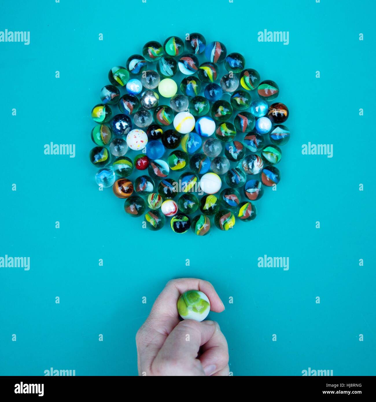 Playing marbles hi-res stock photography and images - Alamy