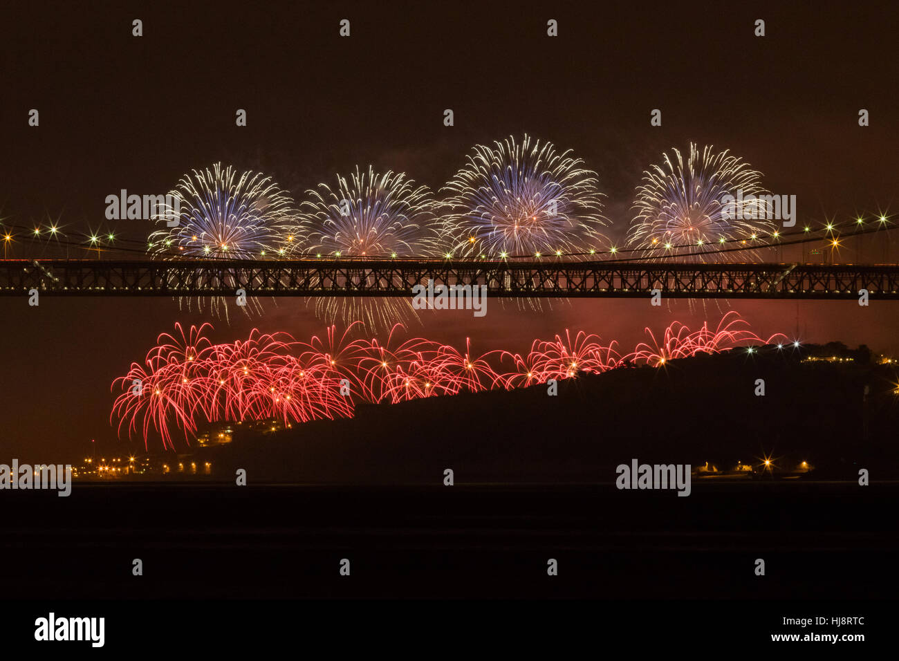 Fireworks over 25th April bridge, Lisbon, Portugal Stock Photo - Alamy