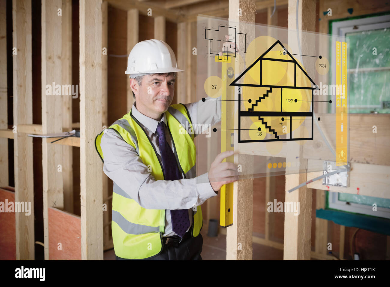 Builder in hardhat using spirit hi-res stock photography and images - Alamy