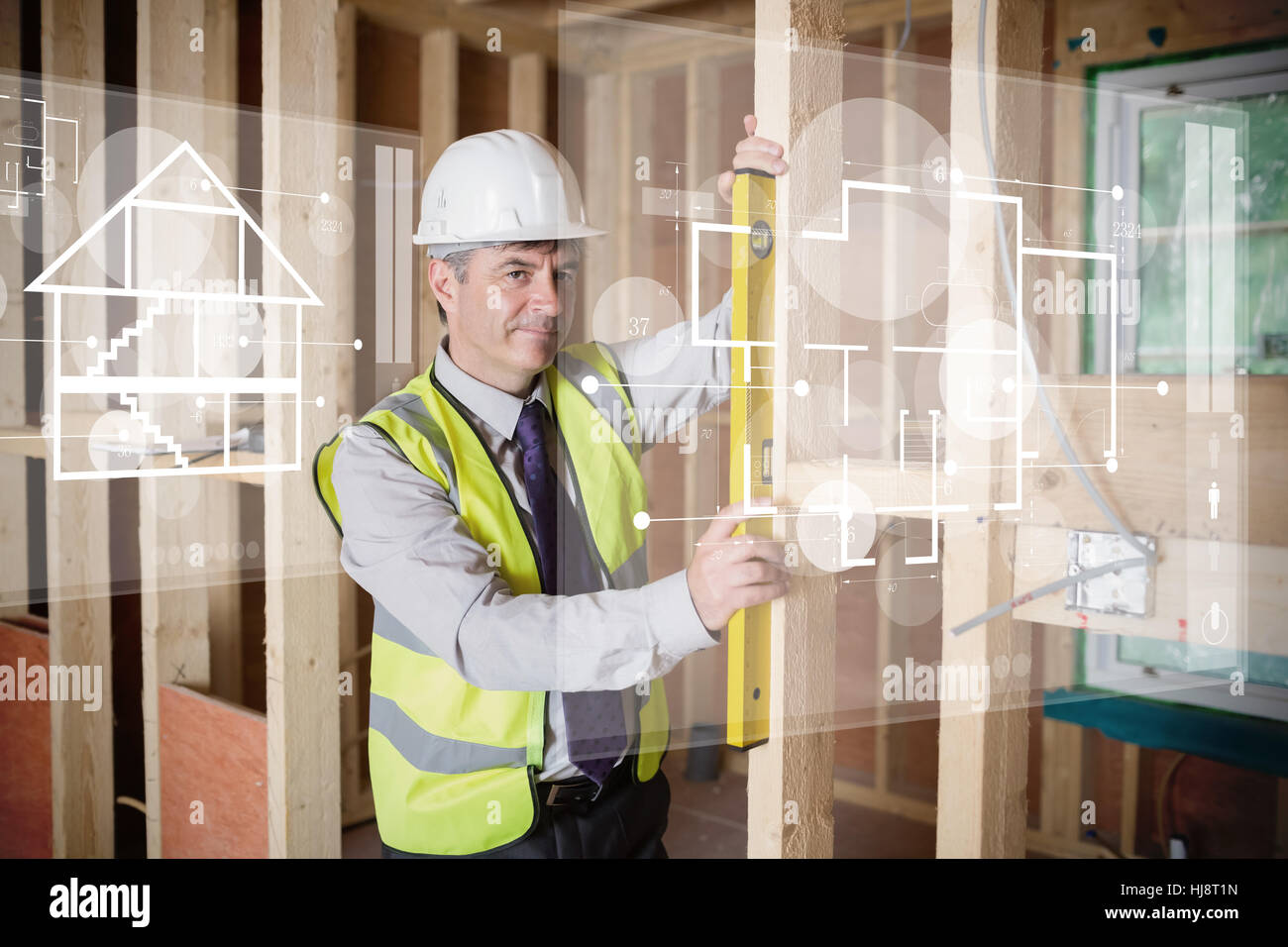 Architect using spirit level while looking at white hologram interfaces ...